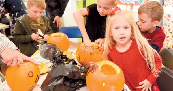 In pictures: Children carve pumpkins at Dedworth Library - Photo 1 of 9 ...