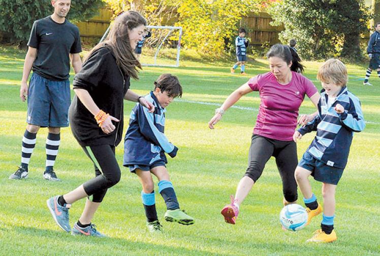Kids give mums the runaround in Papplewick School's annual football ...