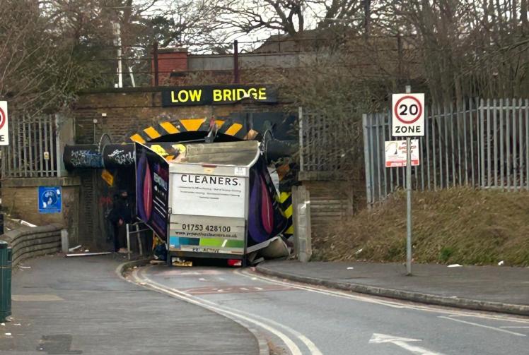 Firefighters called after lorry gets stuck under bridge in Burnham ...